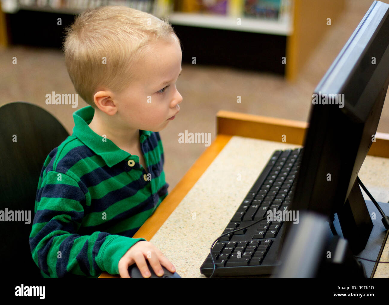 Child computer mouse hi-res stock photography and images - Alamy