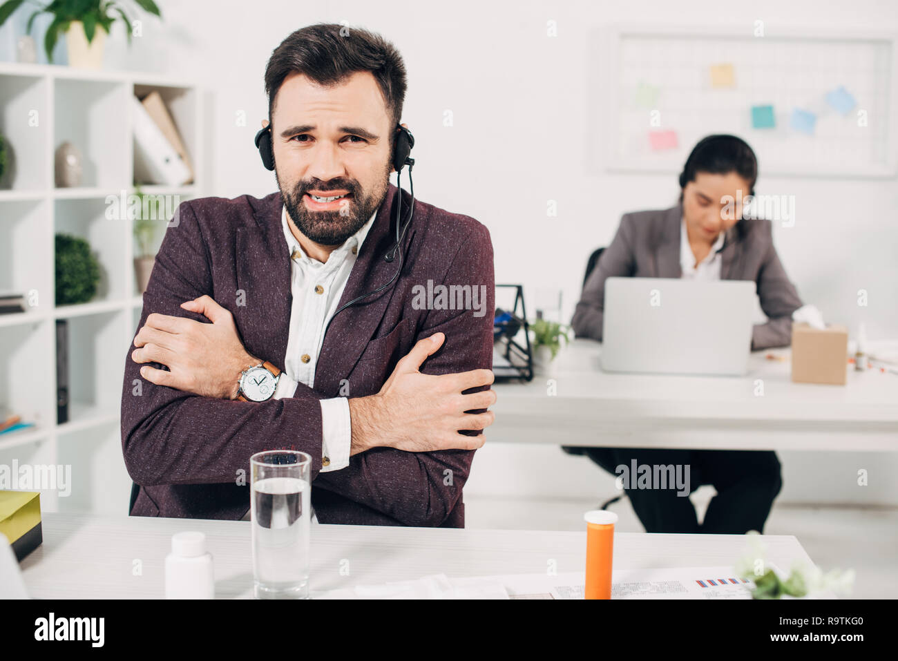 Woman freezing office hi-res stock photography and images - Alamy