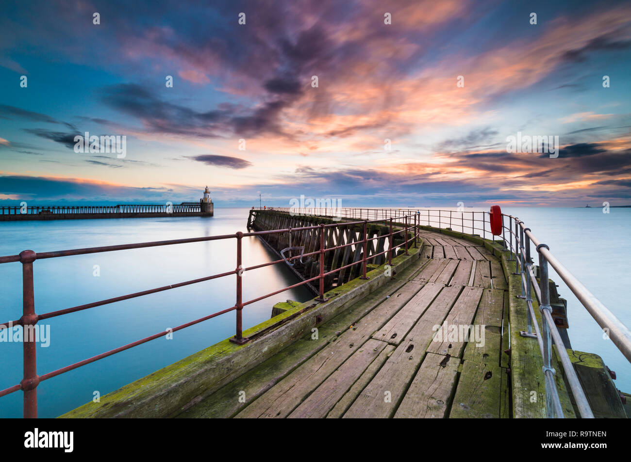 A colourful sunrise on a cold winter morning at Blyth Pier ...
