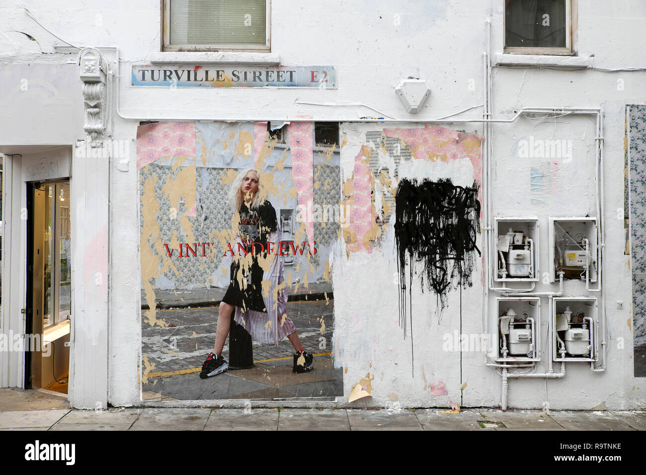 Tattered poster featuring Vinti Andrews model defaced and torn with ...