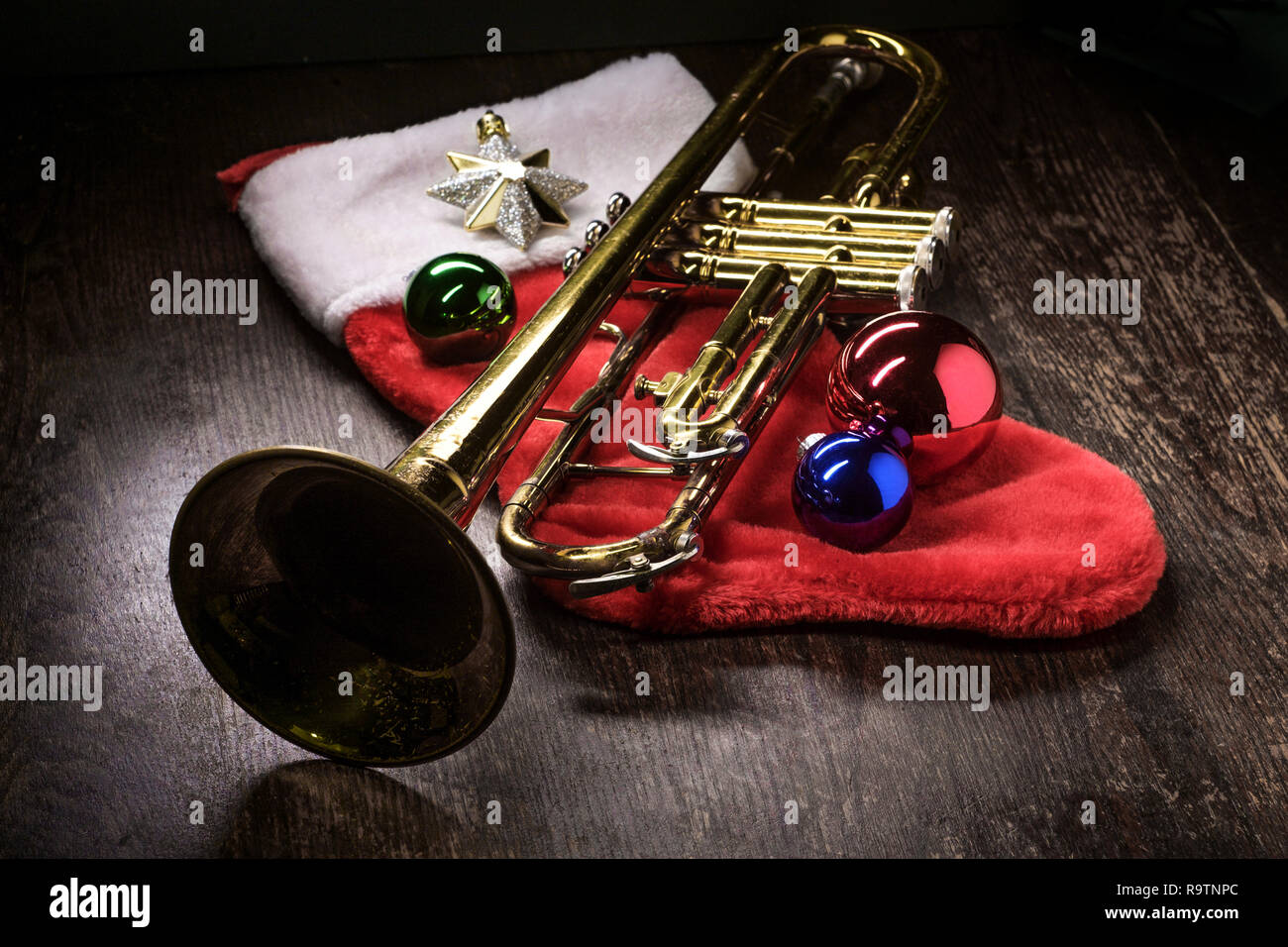 Seasonal Christmas and the holidays musical instrument trumpet with ...