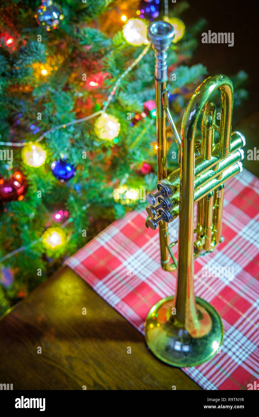 Seasonal Christmas and the holidays musical instrument trumpet with ...