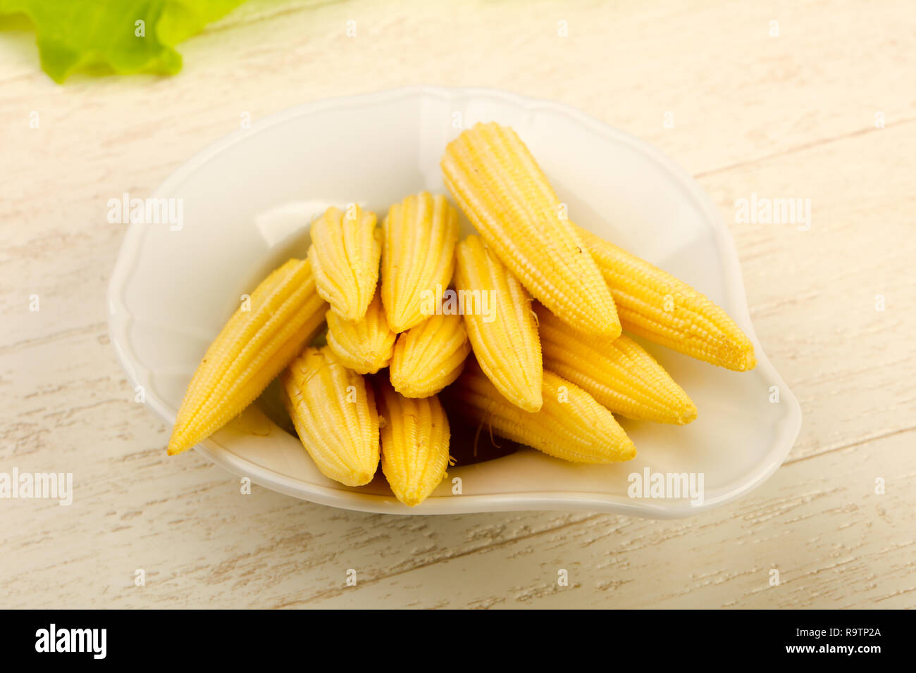Young raw baby corn Stock Photo - Alamy