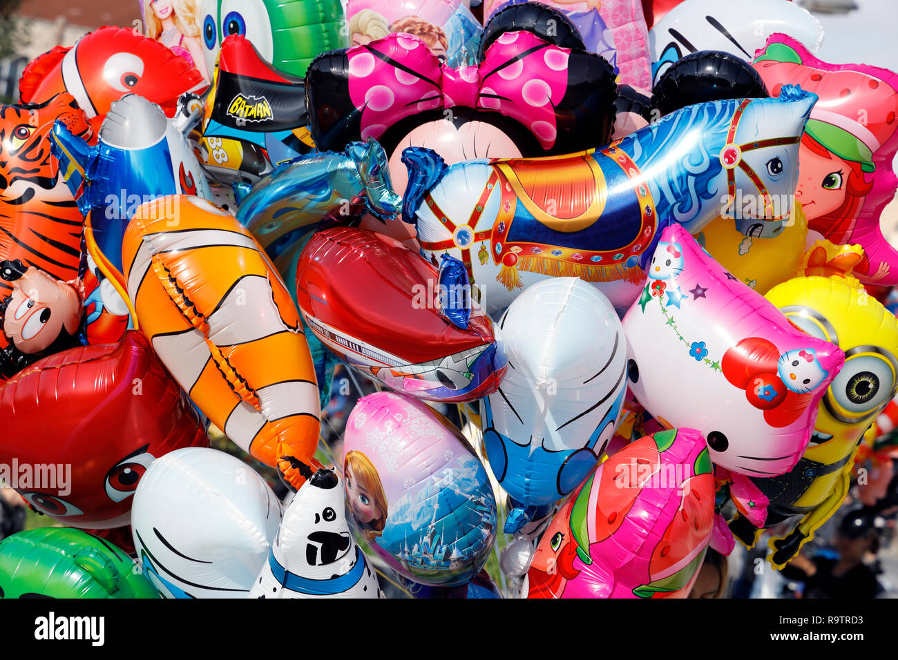 Children playing with balloons hi-res stock photography and images - Alamy