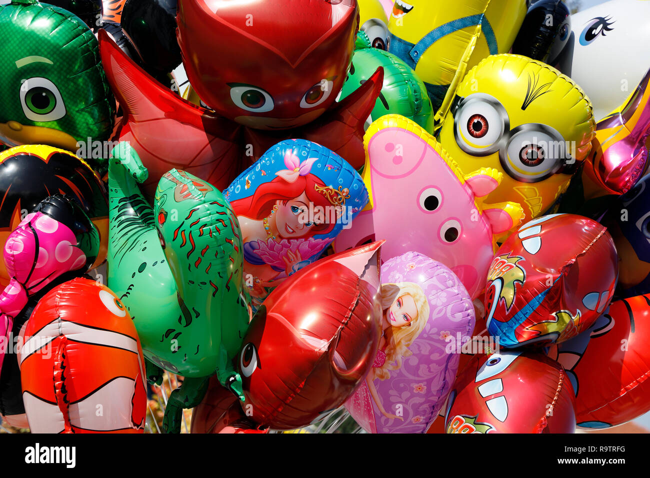 Children playing with balloons hi-res stock photography and images - Alamy