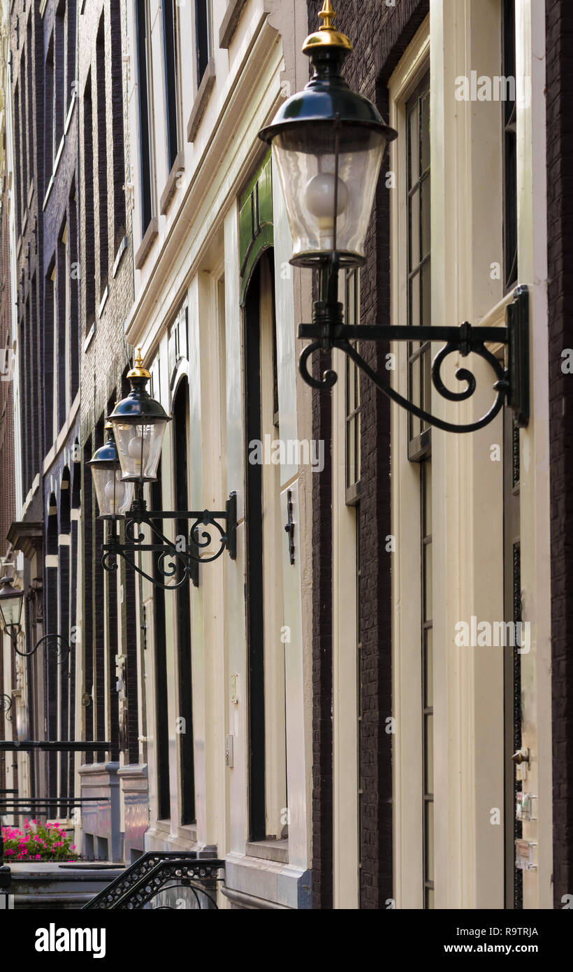 Typical Dutch entries and lamp posts in Amsterdam, the Netherlands ...