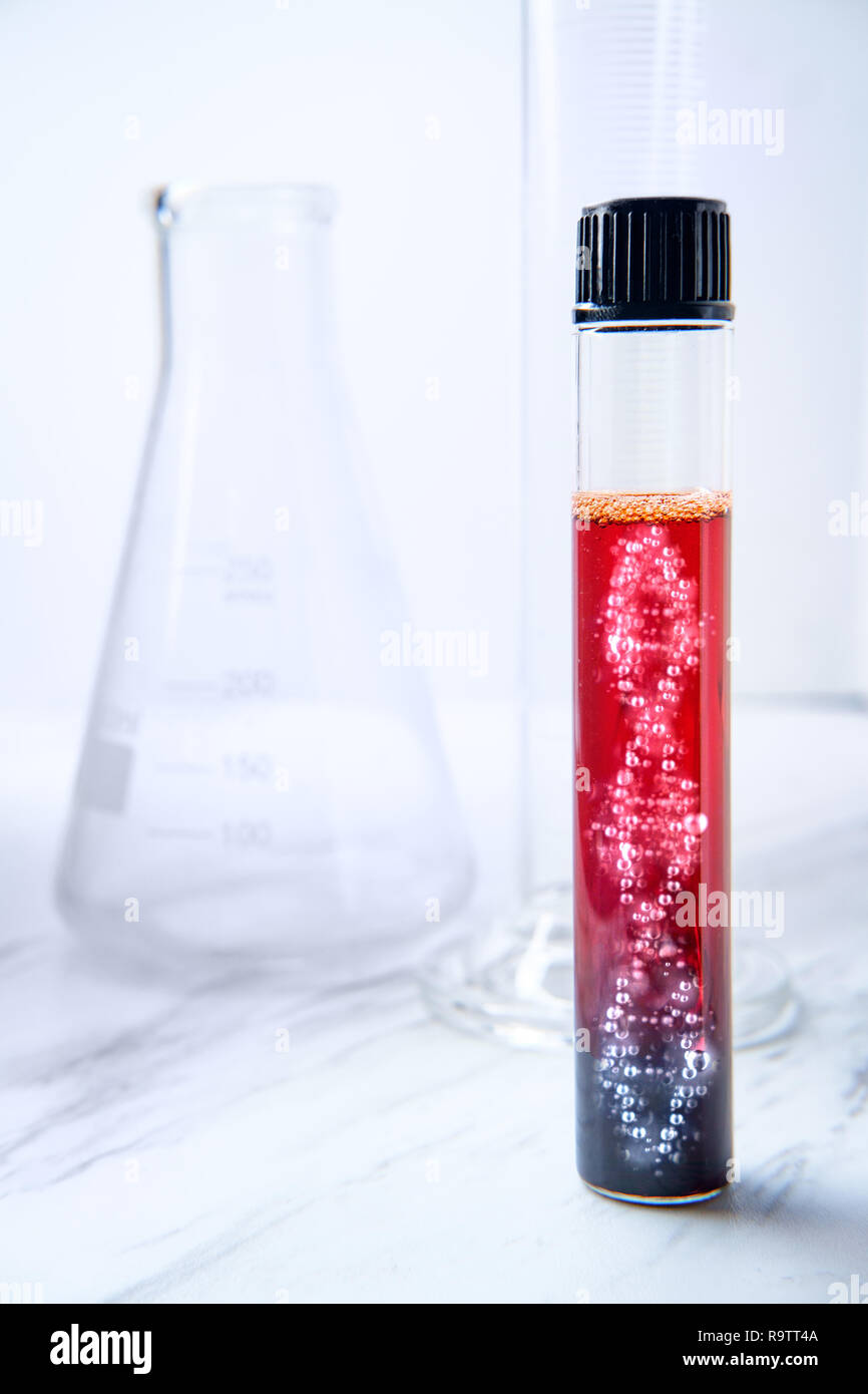 Medical test tube with DNA blood sample for laboratory medical testing ...