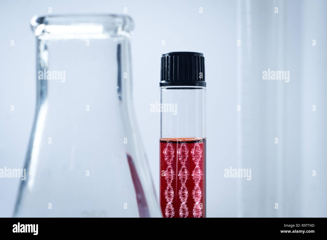 Medical test tube with DNA blood sample for laboratory medical testing ...