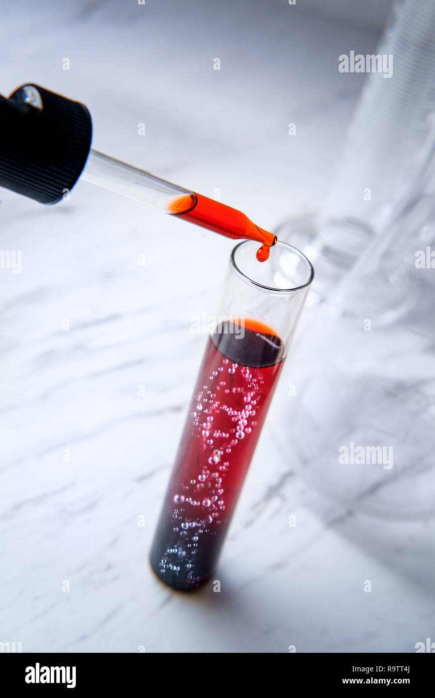 Medical test tube with DNA blood sample for laboratory medical testing ...