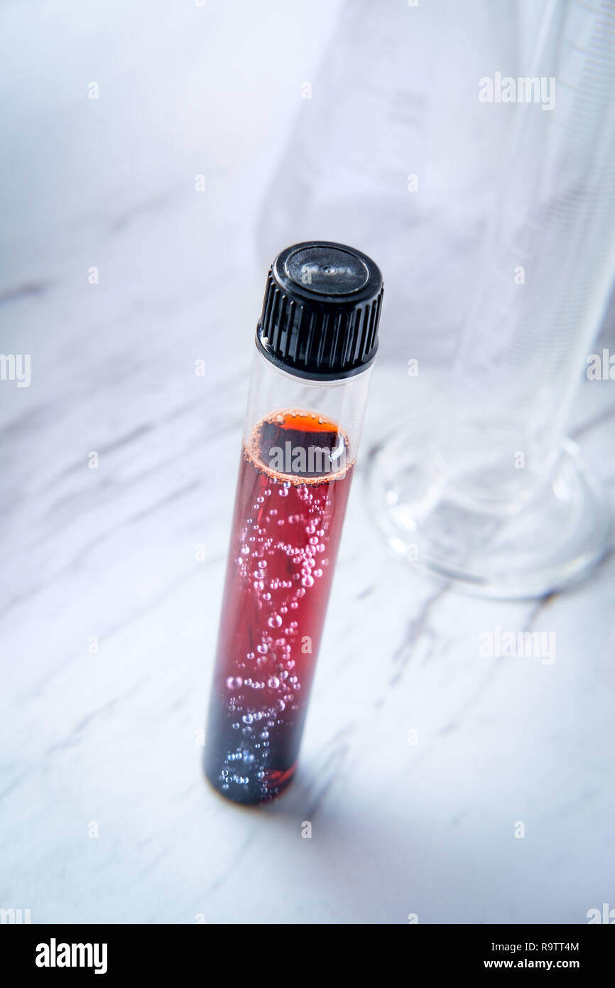 Medical test tube with DNA blood sample for laboratory medical testing ...