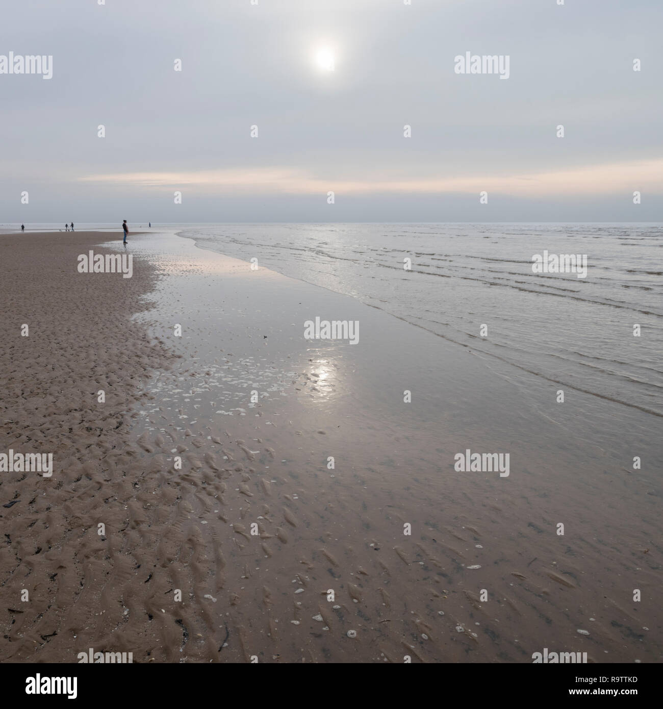 Watery sunlight on the Fylde shore at Lytham St. Anne's on the ...