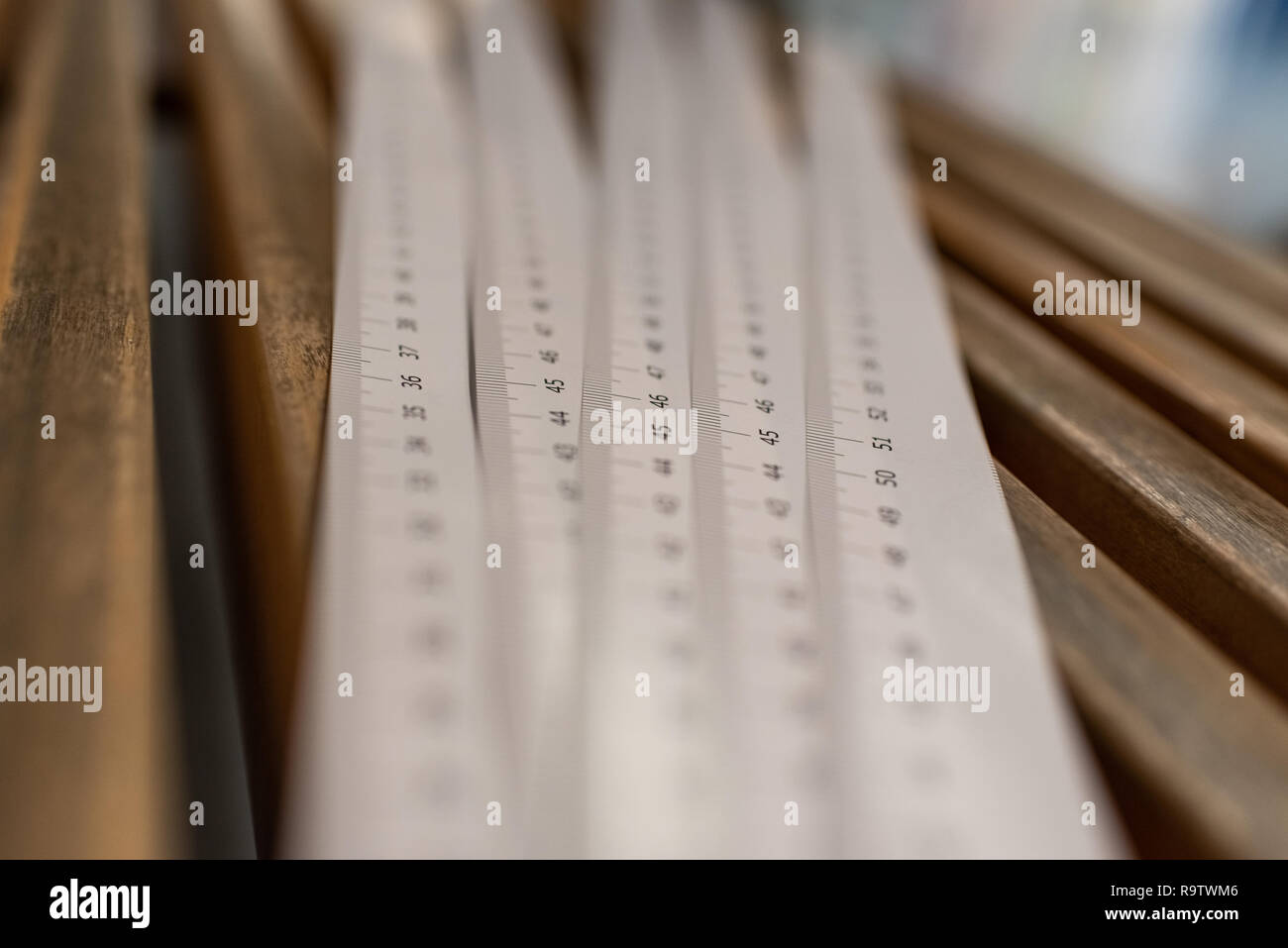 Strips of paper to measure metric distances Stock Photo - Alamy