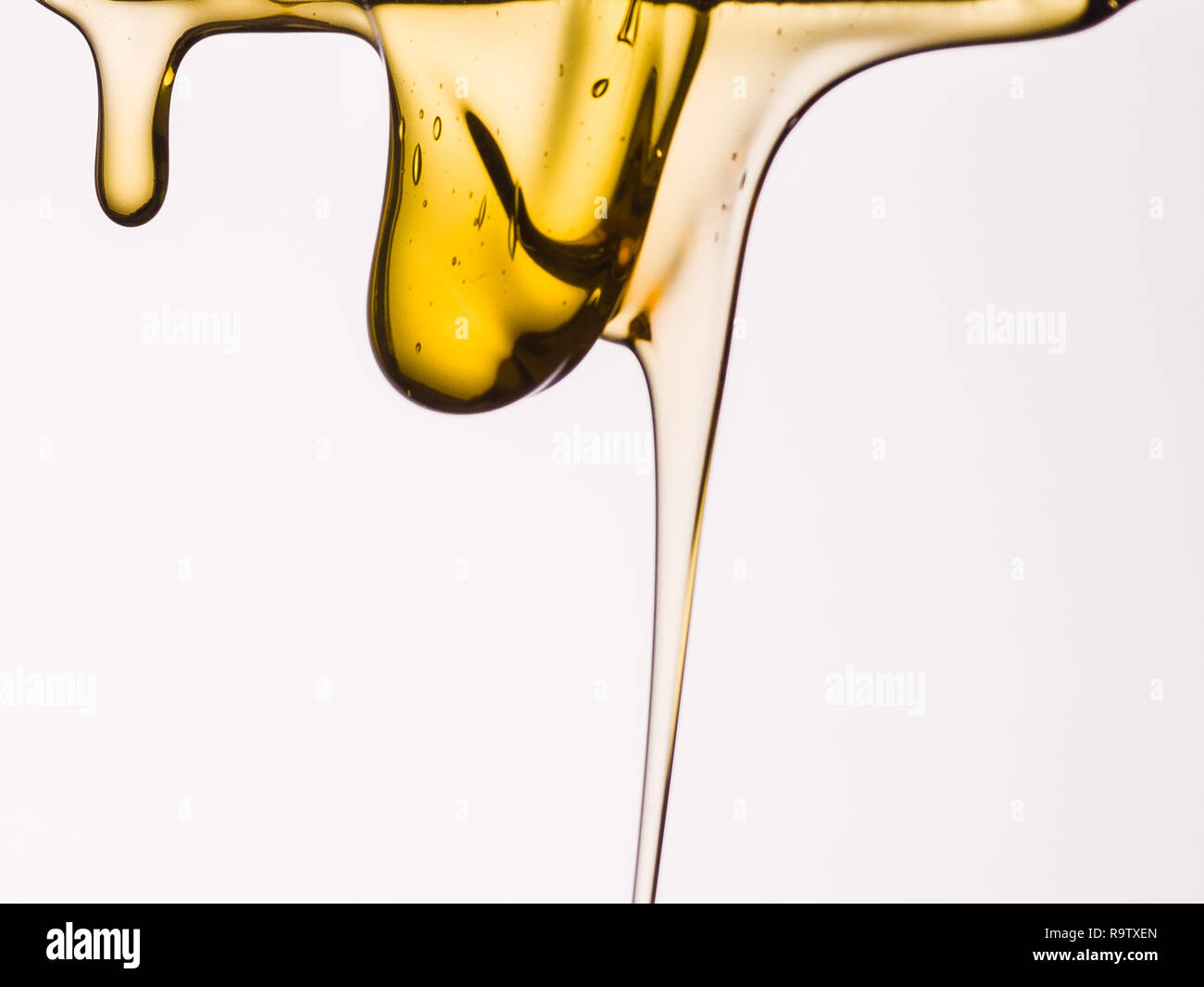 oil flowing shape. syrup flowing shape Stock Photo - Alamy