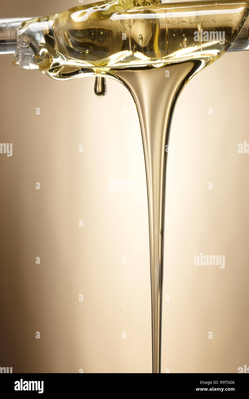oil flowing shape. syrup flowing shape Stock Photo - Alamy