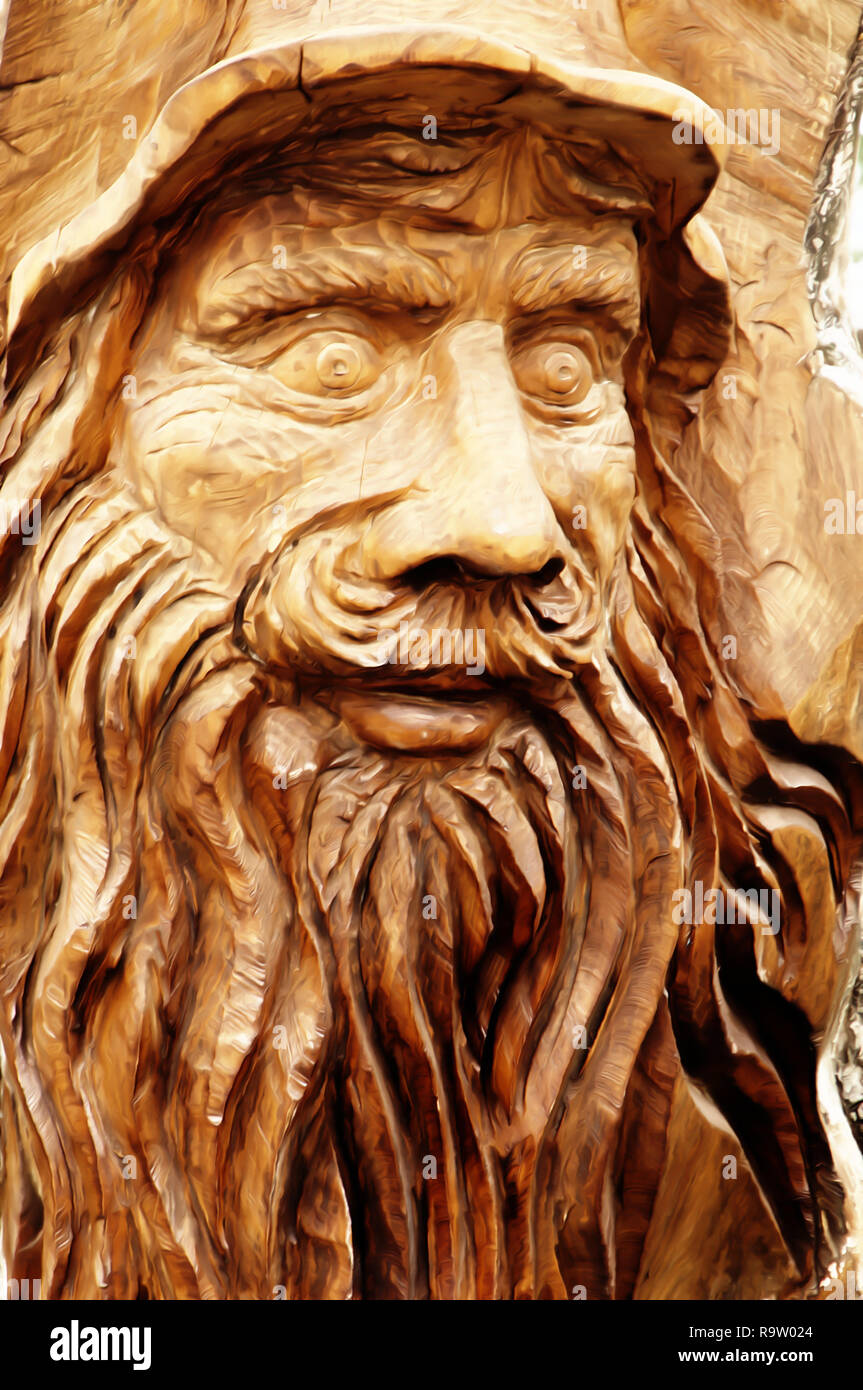 Treebeard; sculpture of bearded man carved into tree stump on ...