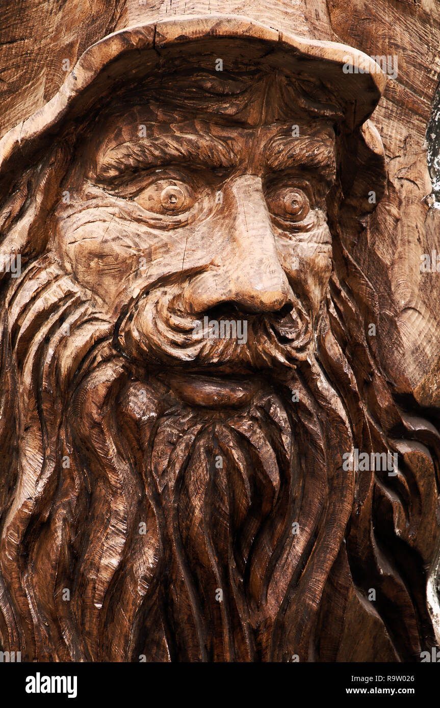 Treebeard; sculpture of bearded man carved into tree stump on ...