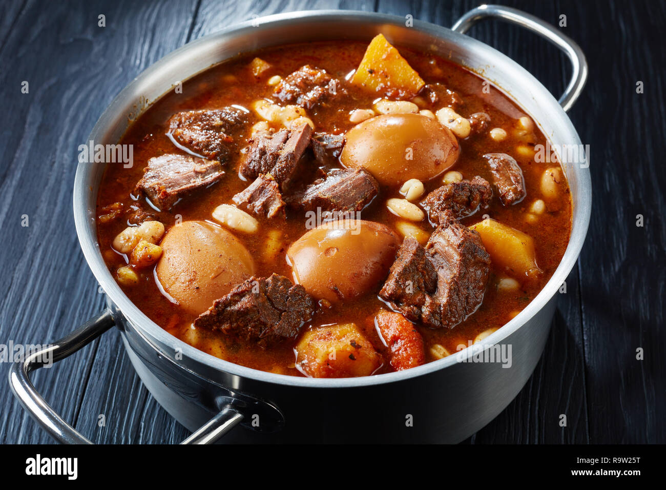 close-up of Traditional Jewish Cholent (Hamin) - main dish for the ...