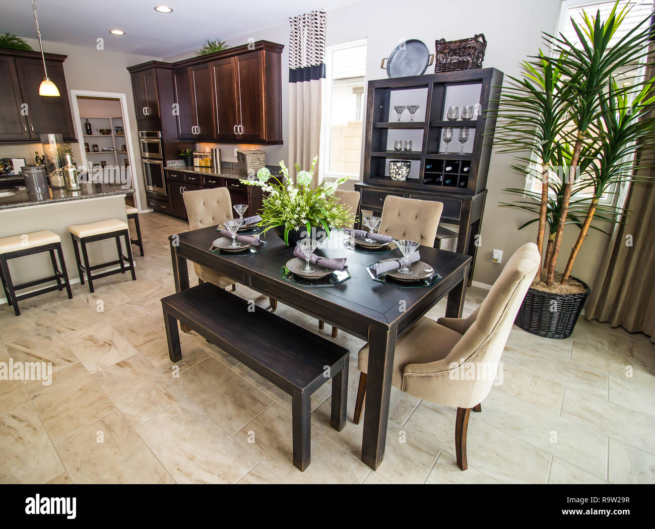 Modern Eating Area Off New Kitchen With Island Stock Photo - Alamy