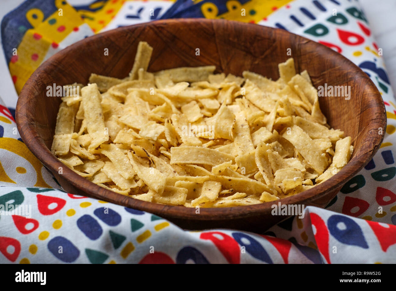 Crispy soup topping Mexican corn tortilla chip strips Stock Photo - Alamy