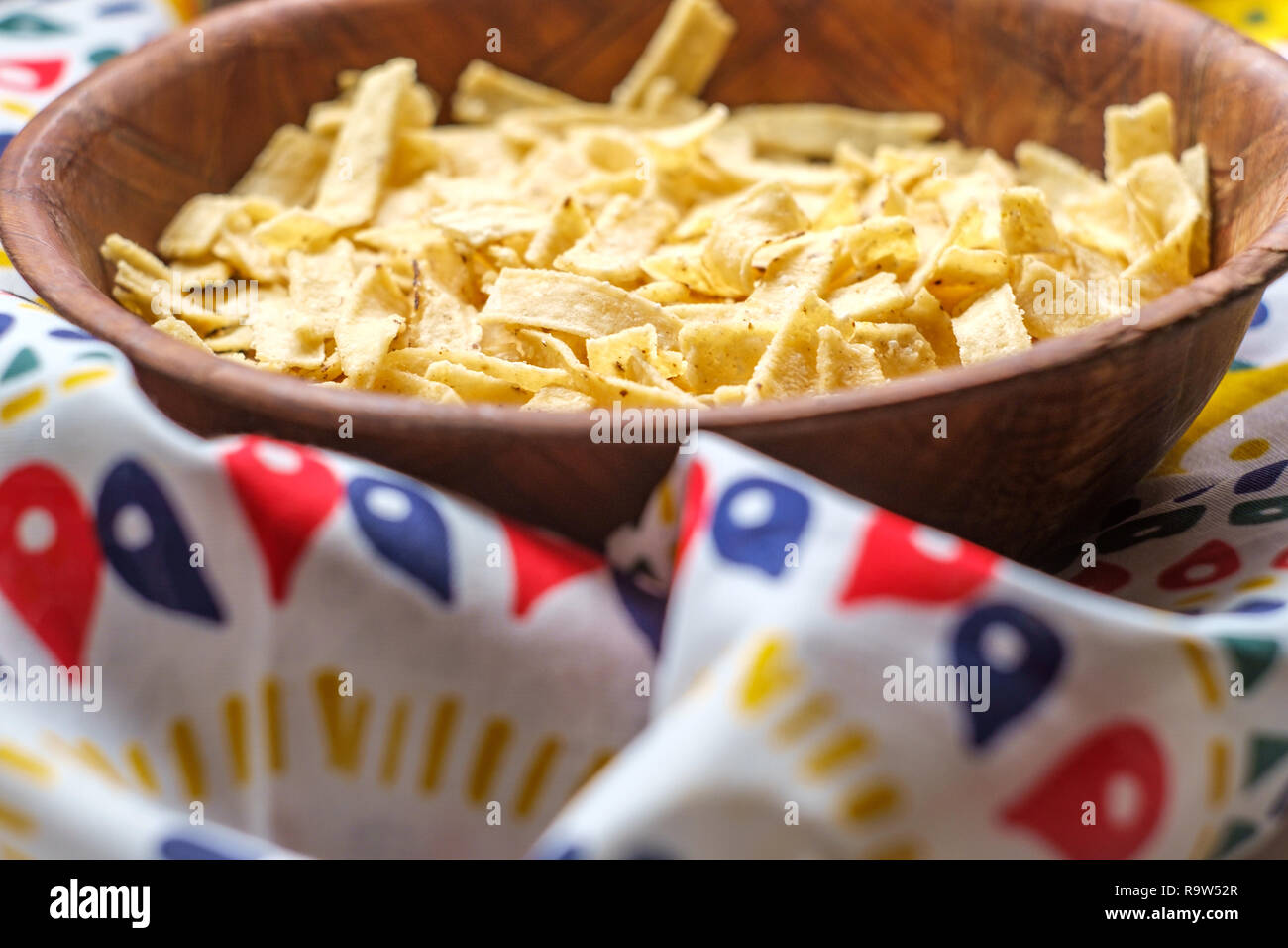Crispy soup topping Mexican corn tortilla chip strips Stock Photo - Alamy