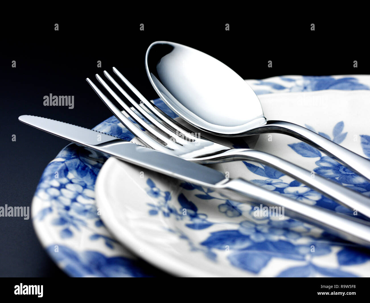 Silver cutlery on decorated hi-res stock photography and images - Alamy