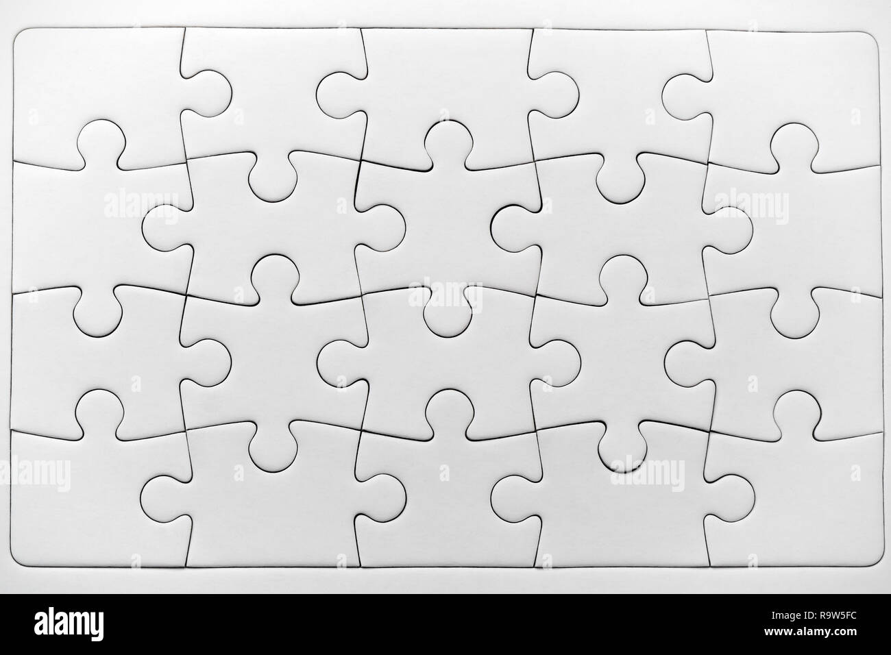 White jigsaw puzzle pattern isolated Stock Photo - Alamy