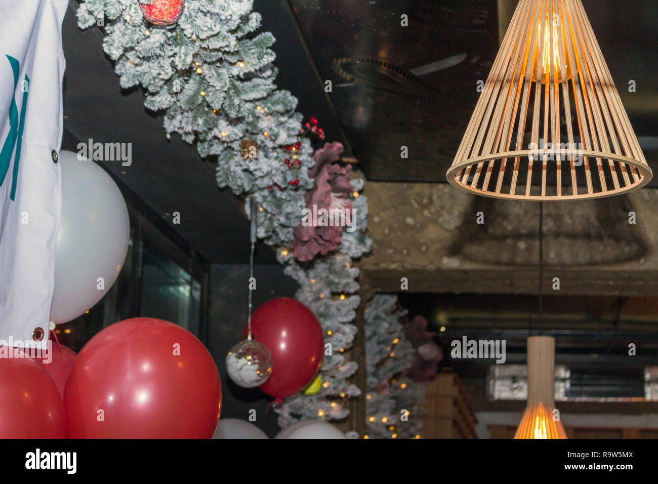 Christmas decoration of the wall with branches of a Christmas tree ...