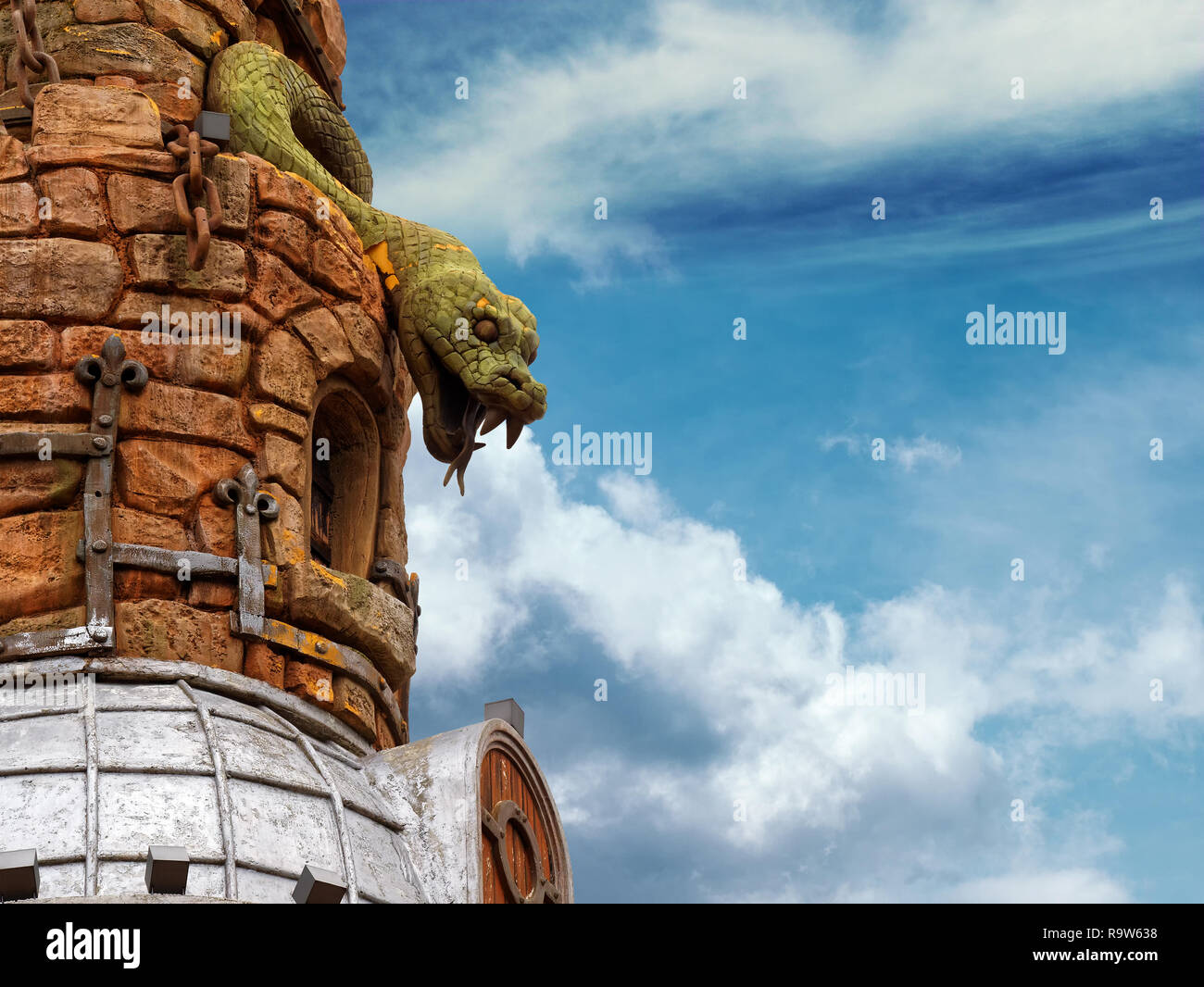 Snake drake clinging on the tower under storm and lightning Stock Photo ...