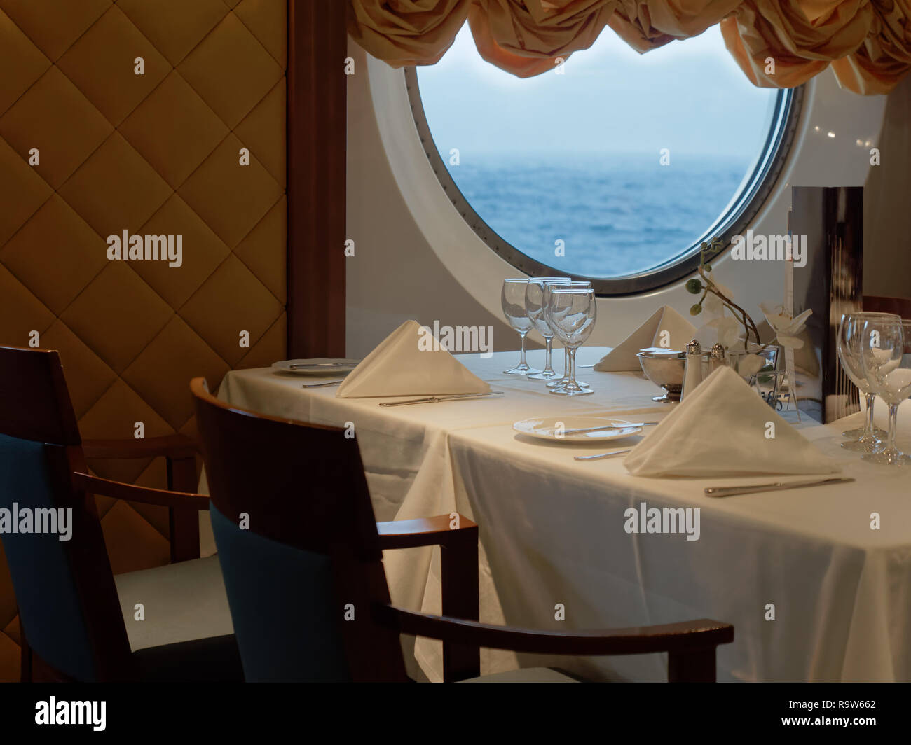 Romantic Dinner table set with sea view Stock Photo - Alamy