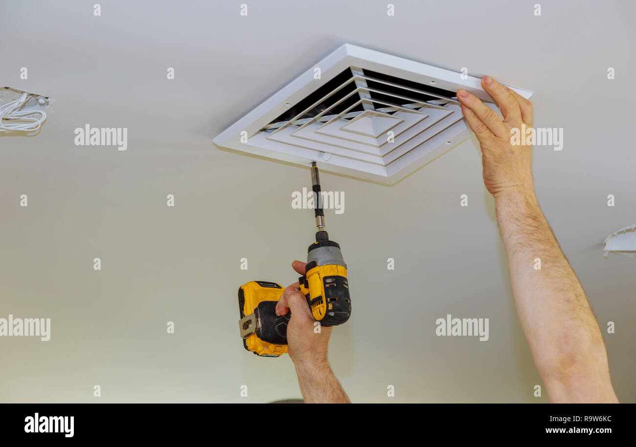 The process of installing mounting skin ceiling covered by plastic ...