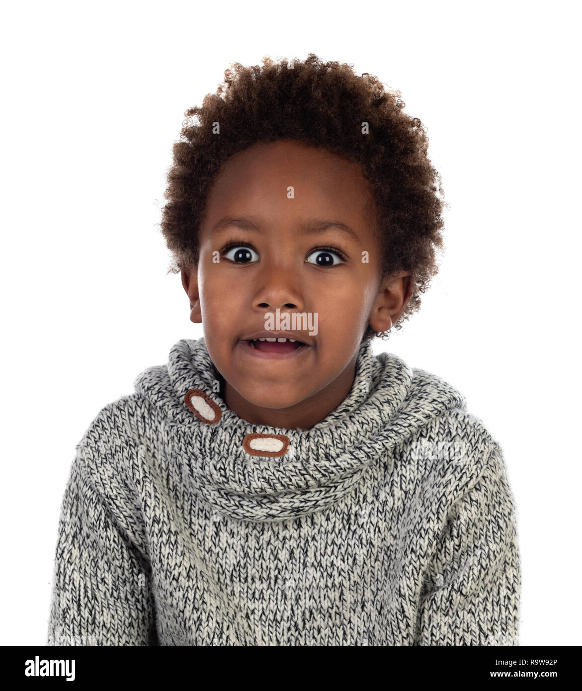 Funny expression of a small african child isolated on a white ...