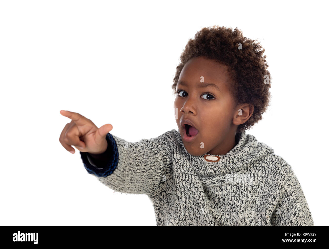 Cute kid pointing with his finger isolated on white background Stock ...