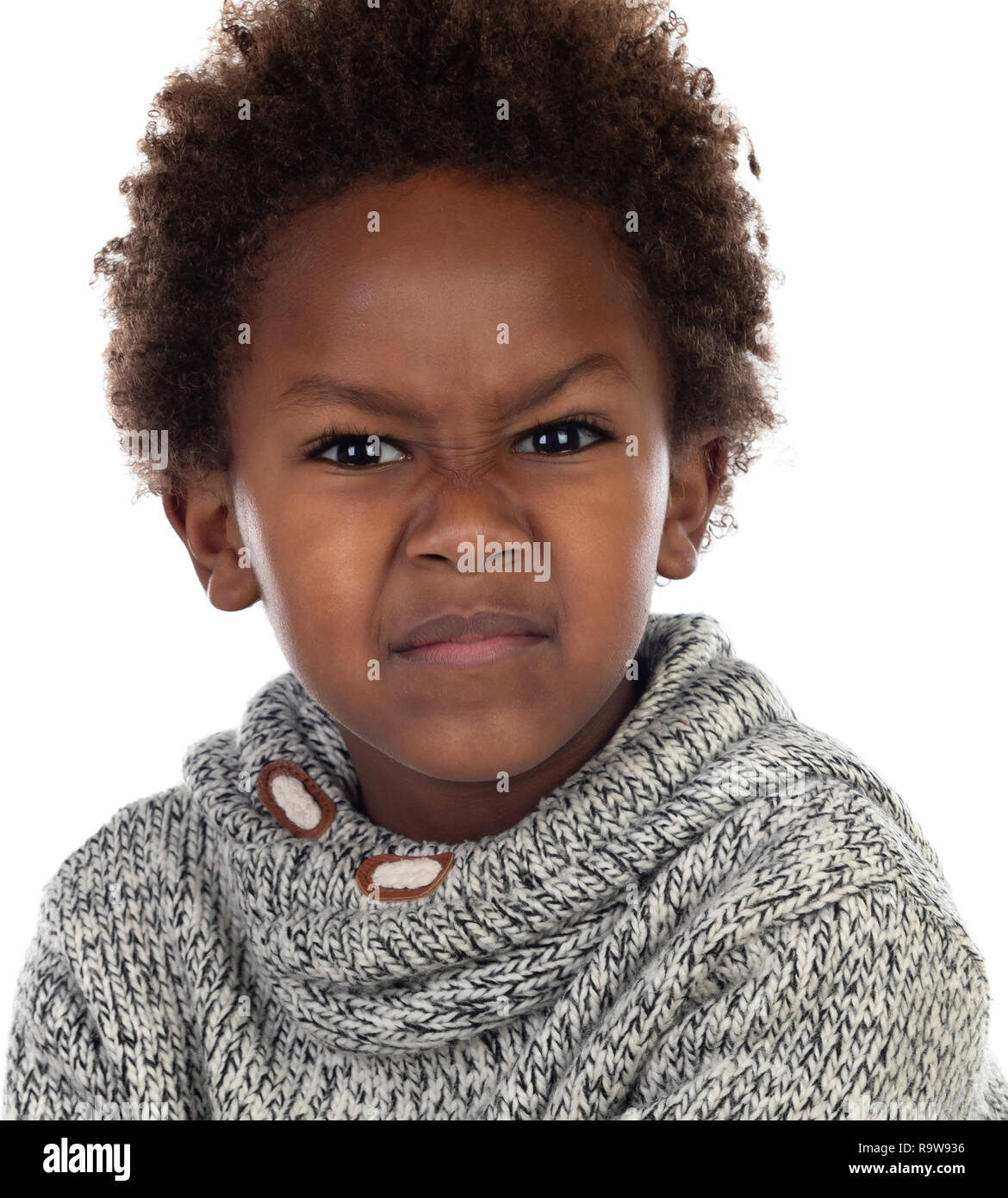 Angry african child with wool jersey isolated on a white background ...