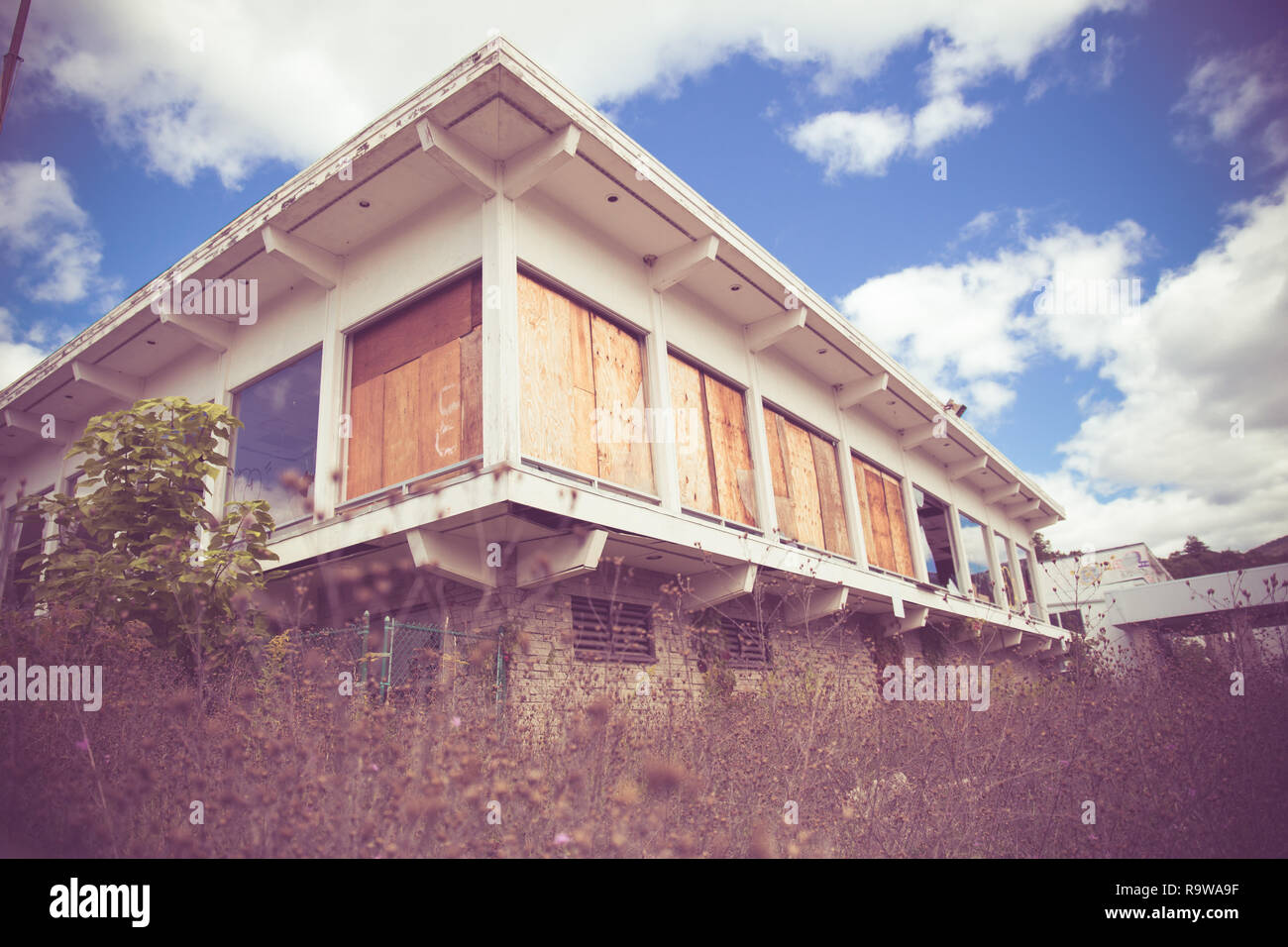 Abandoned hotel building with vintage mid-century modern architectural ...