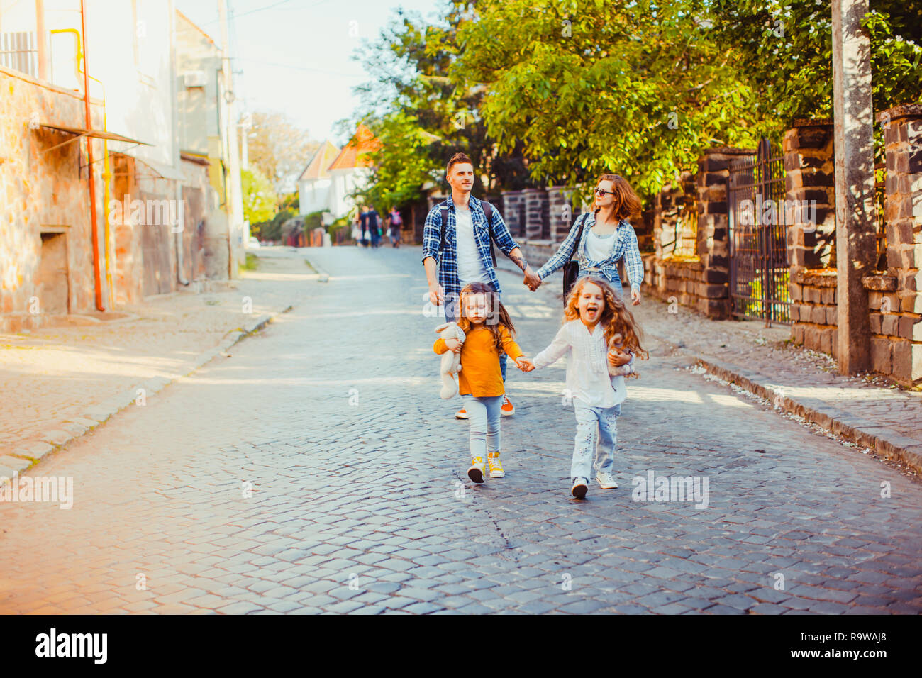 Running towards camera happy urban hi-res stock photography and images ...