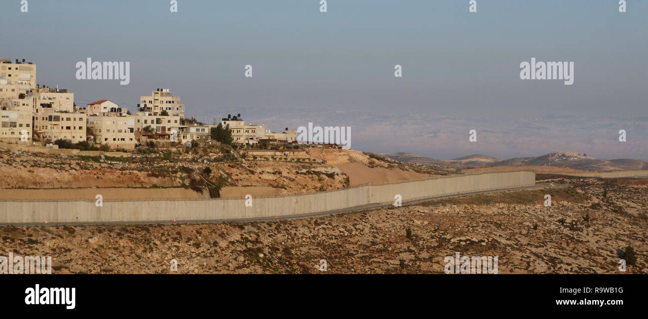 View of the West Bank separation barrier built by Israel surrounding ...