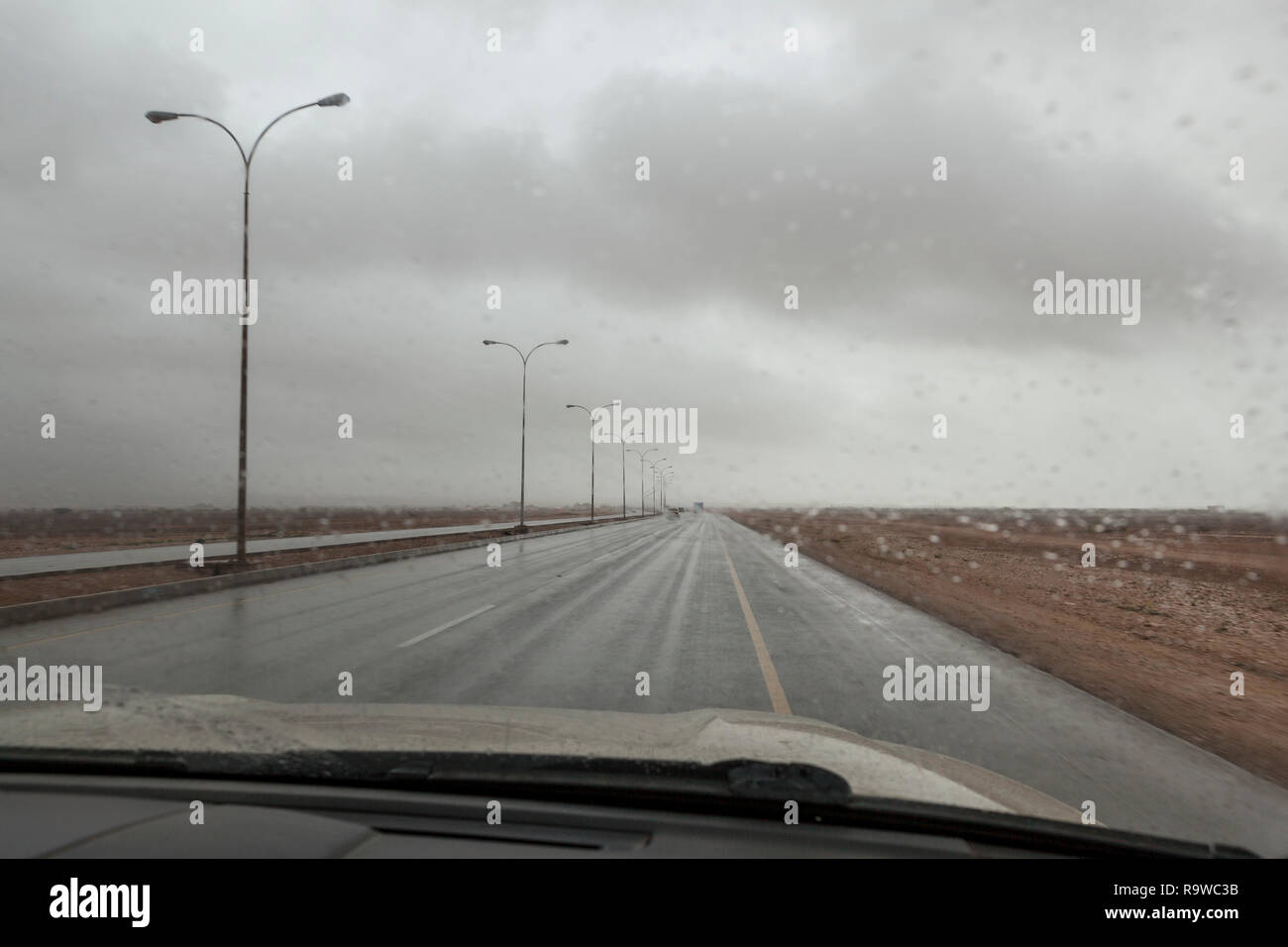 View through a windscreen of a 4x4 during the rainy weather of the ...