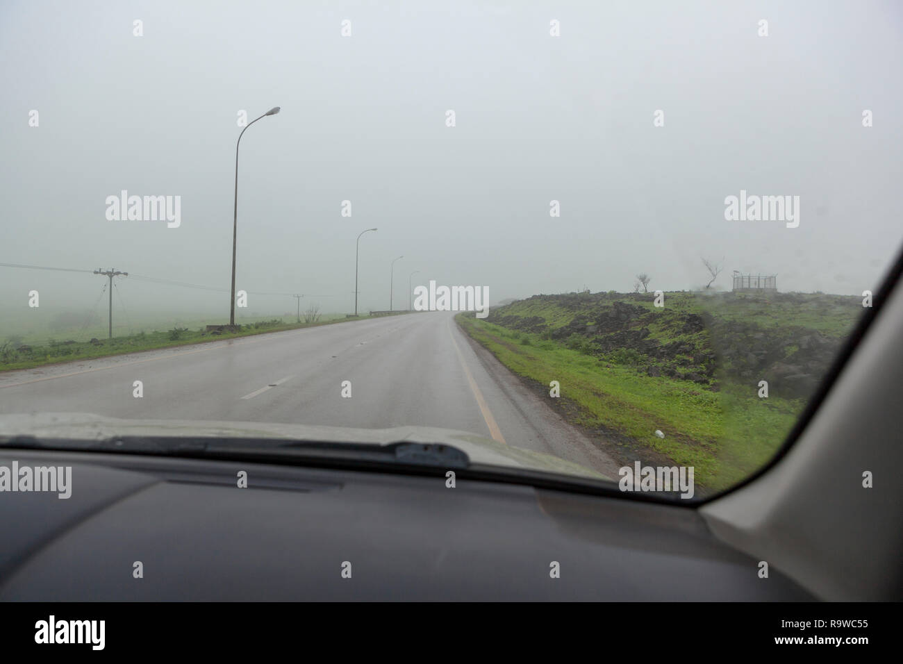 View through a windscreen of a 4x4 during the rainy weather of the ...