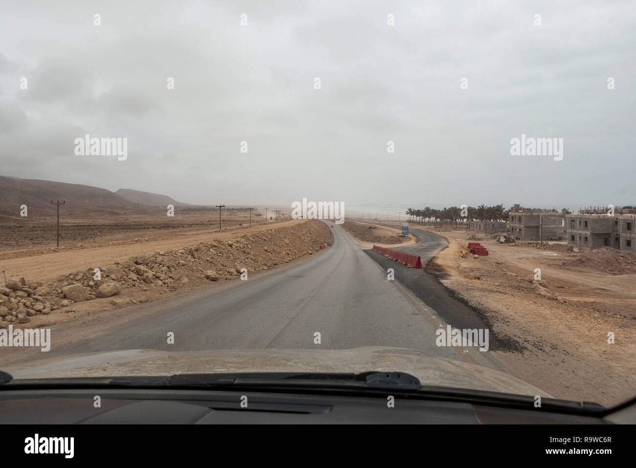 View through a windscreen of a 4x4 during the Khareef monsoon season ...