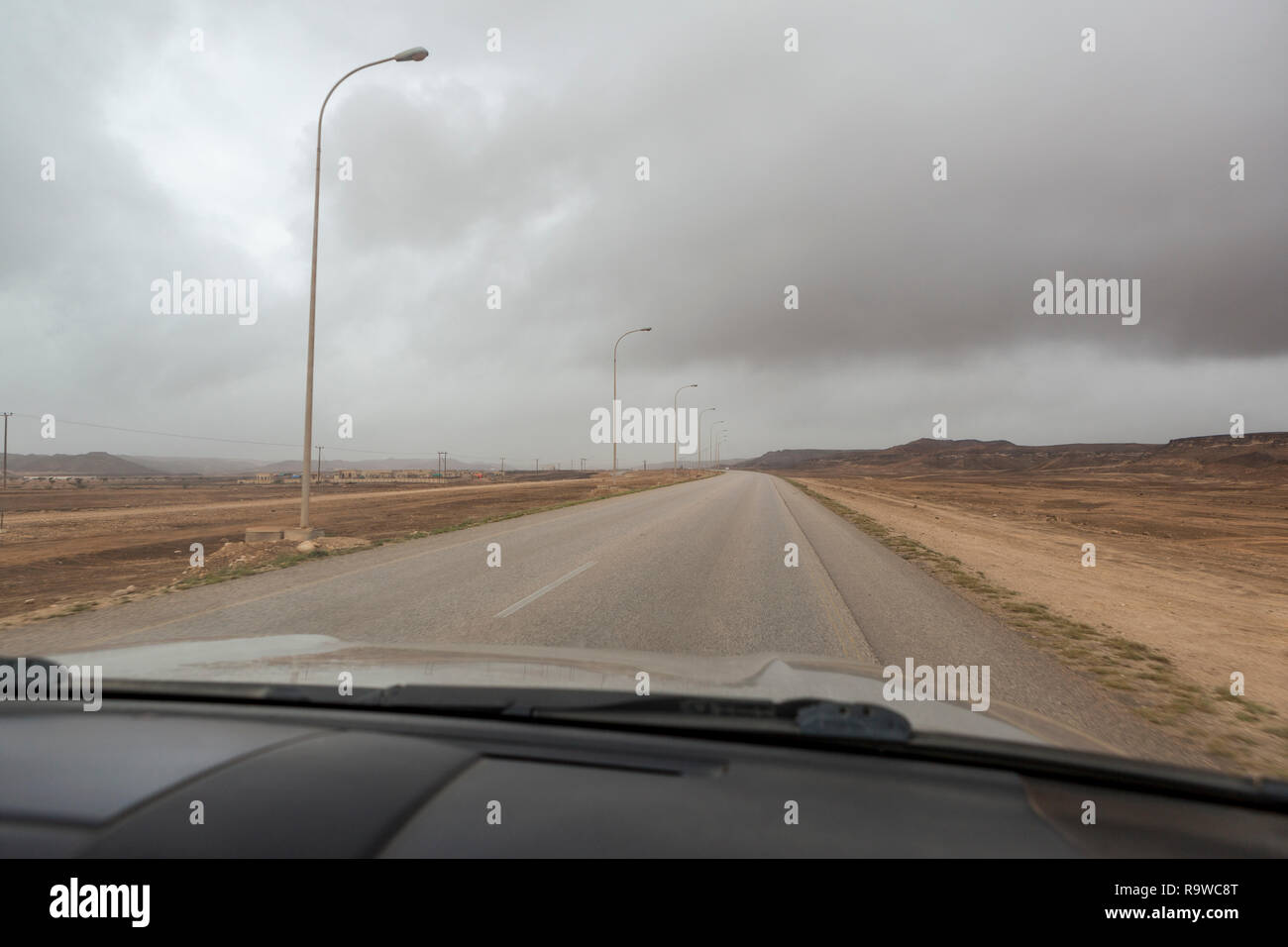 View through a windscreen of a 4x4 during the rainy weather of the ...