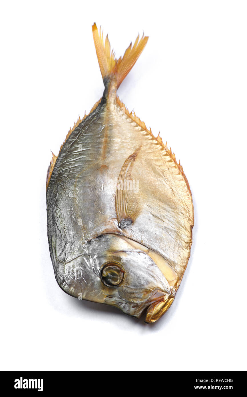 Smoked vomer fish on white isolated background Stock Photo - Alamy