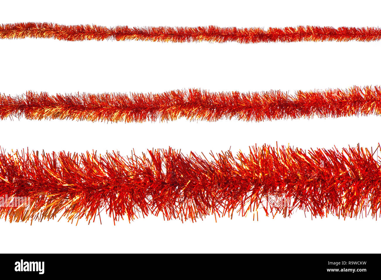 Tinsels in different size isolated on white background Stock Photo - Alamy