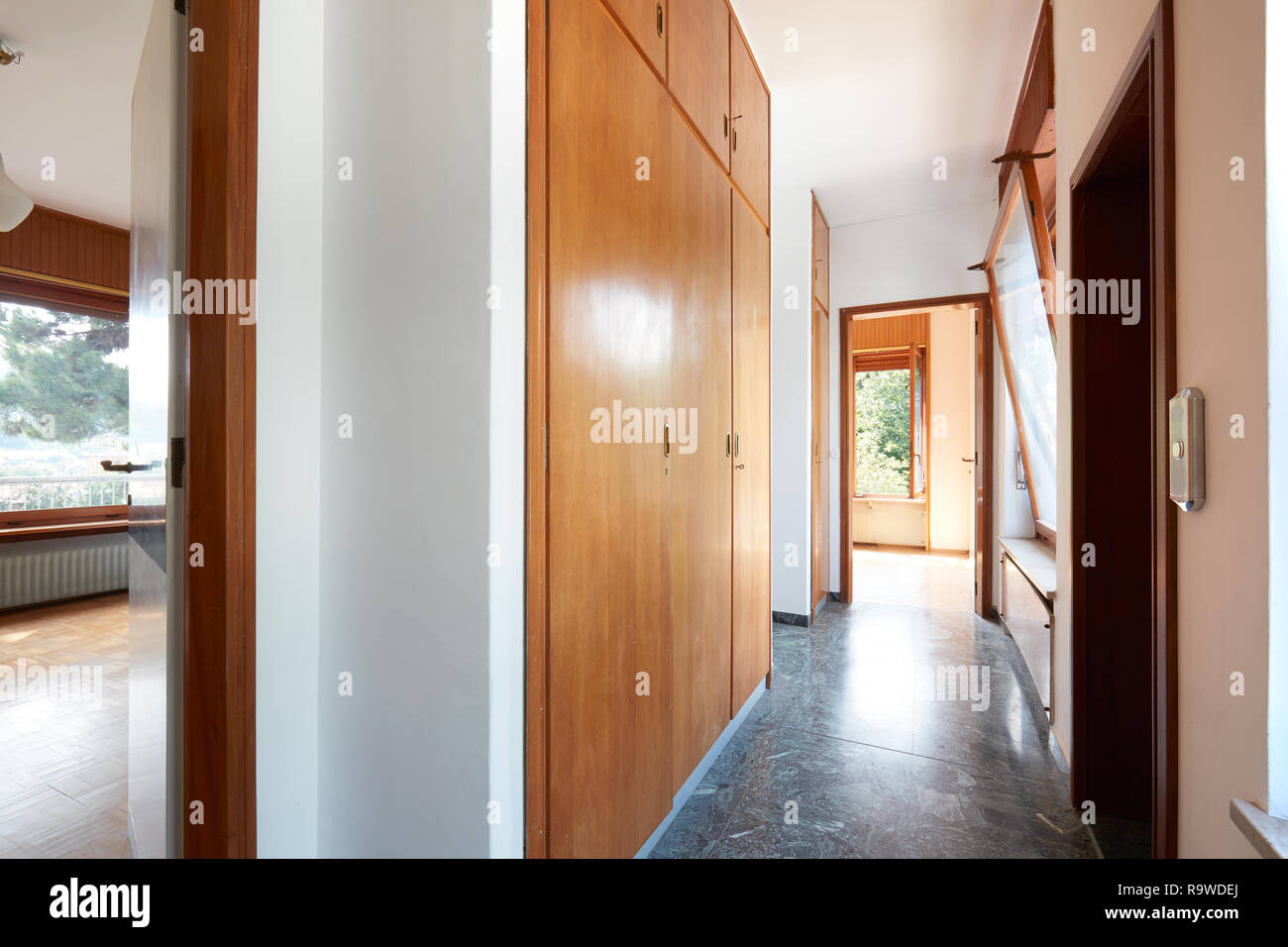 Corridor and interior with wardrobe in country house Stock Photo - Alamy