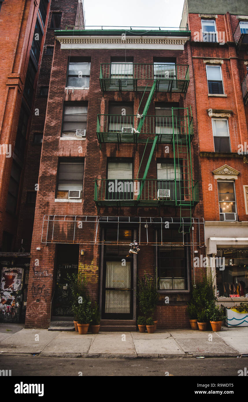 Typical New York City buildings in warm fall colours with external fire ...