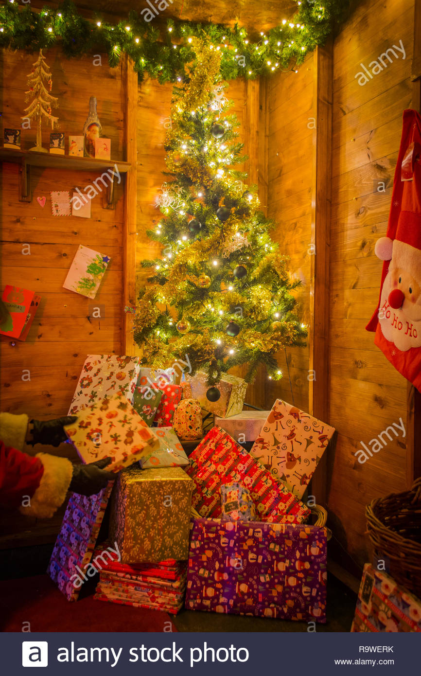 Santa Claus Leaving Gifts Under Stock Photos & Santa Claus Leaving ...