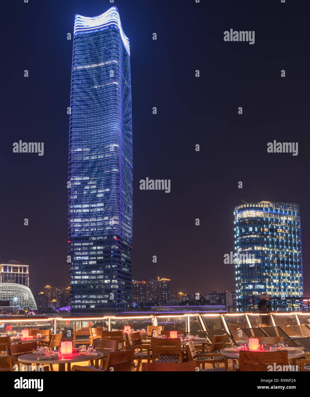White Magnolia Plaza in Shanghai at night Stock Photo - Alamy