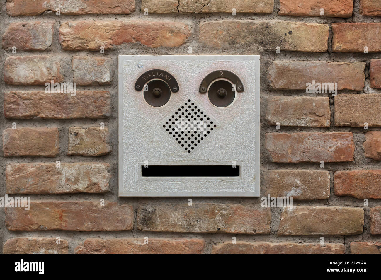 Doorbells and letterbox in the shape of a smiley in Venice, Italy Stock ...