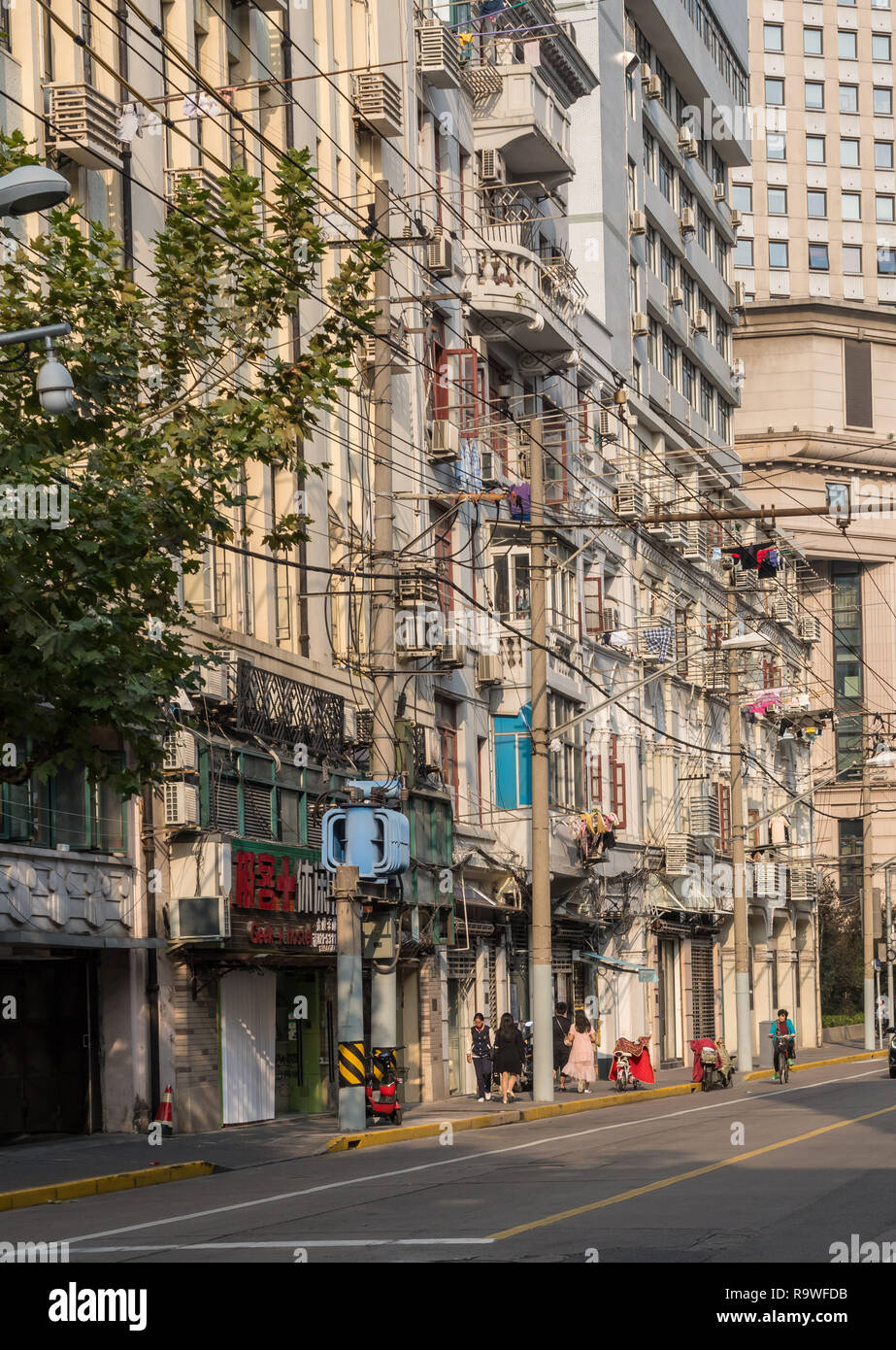 Electric and telephone cabling on building walls in Shanghai China ...