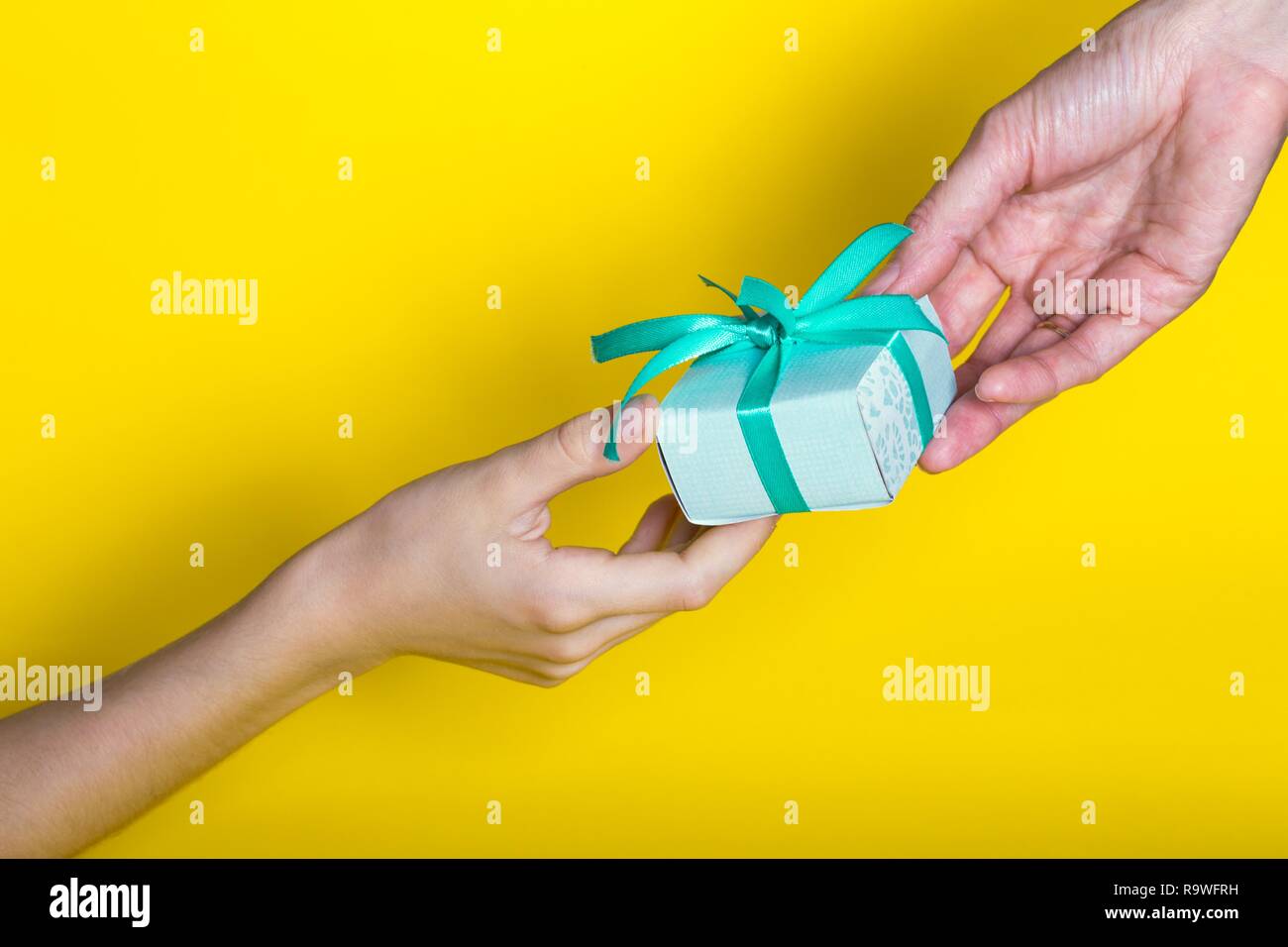gift is given to the recipient on a yellow background. Birthday Stock ...