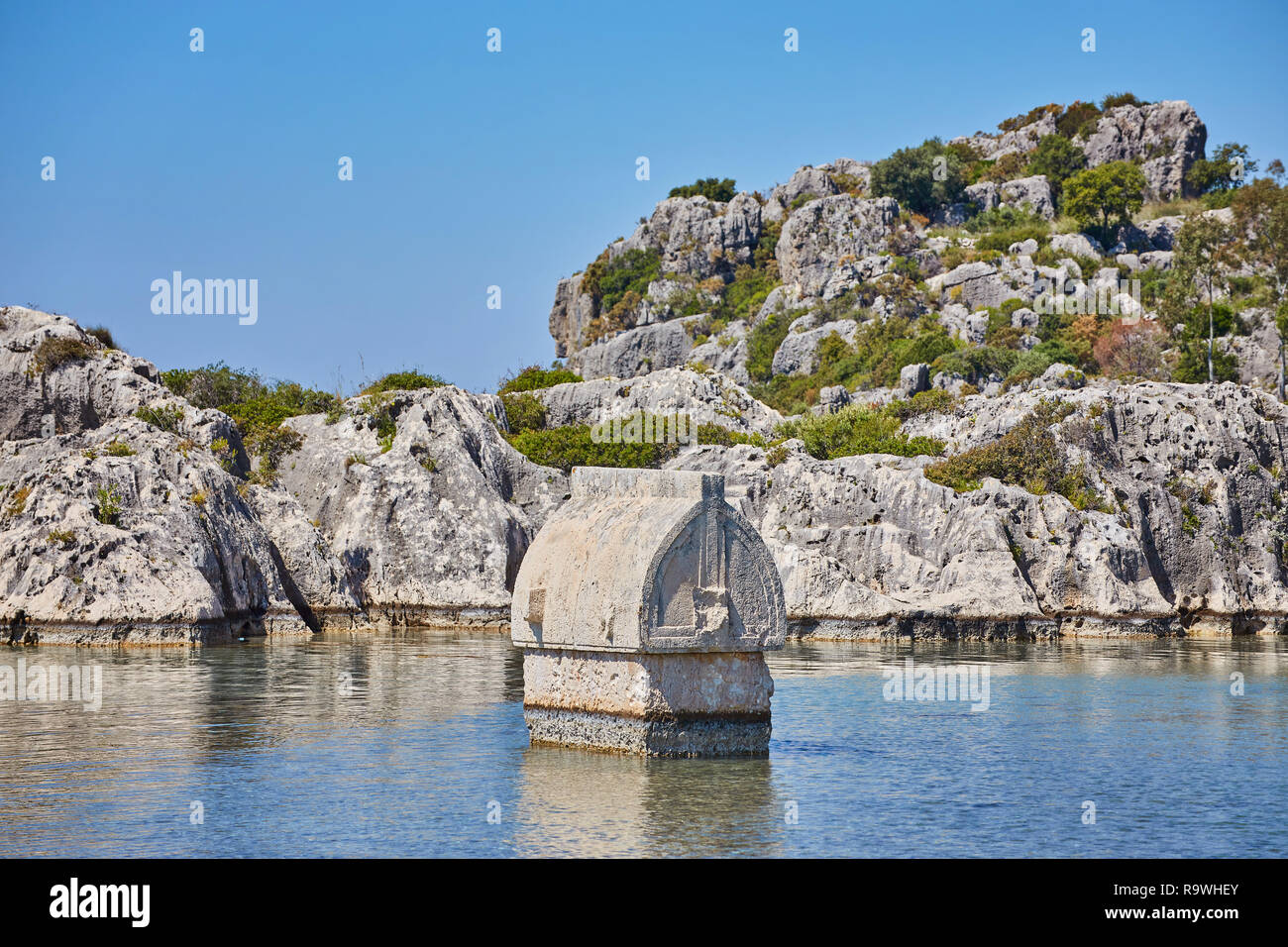 Lycian stone sarcophagus with pointed lid of the roman era popping up ...